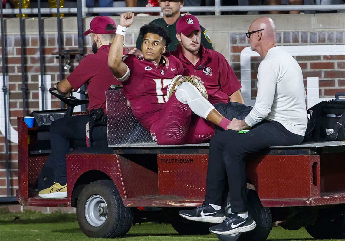 Florida State QB Jordan Travis carted off after injury to left leg ...