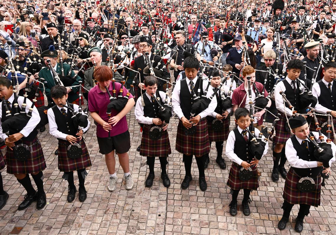 Bagpipers claim world record with AC/DC's 'It's a Long Way to the Top ...