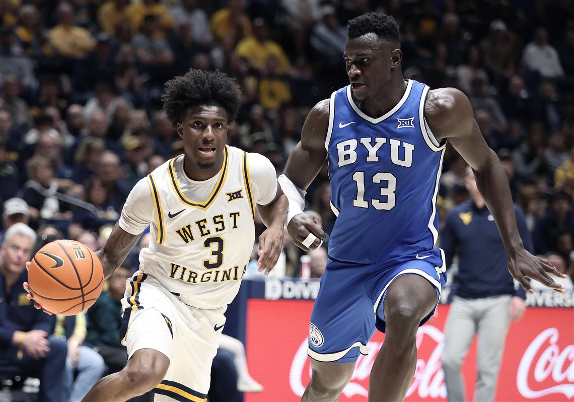 Honor Huff scores 24 to lead West Virginia over UCF 77-62 in regular ...