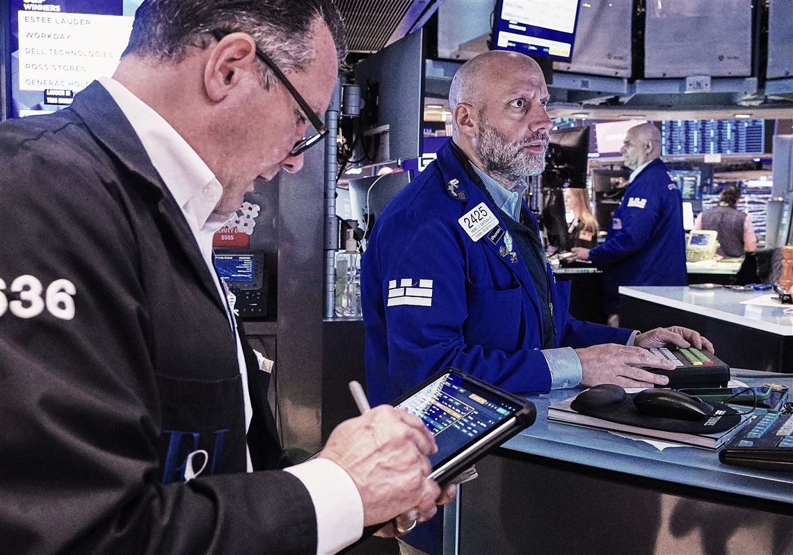 Wall Street hangs near its records as oil prices ease | Pittsburgh Post ...